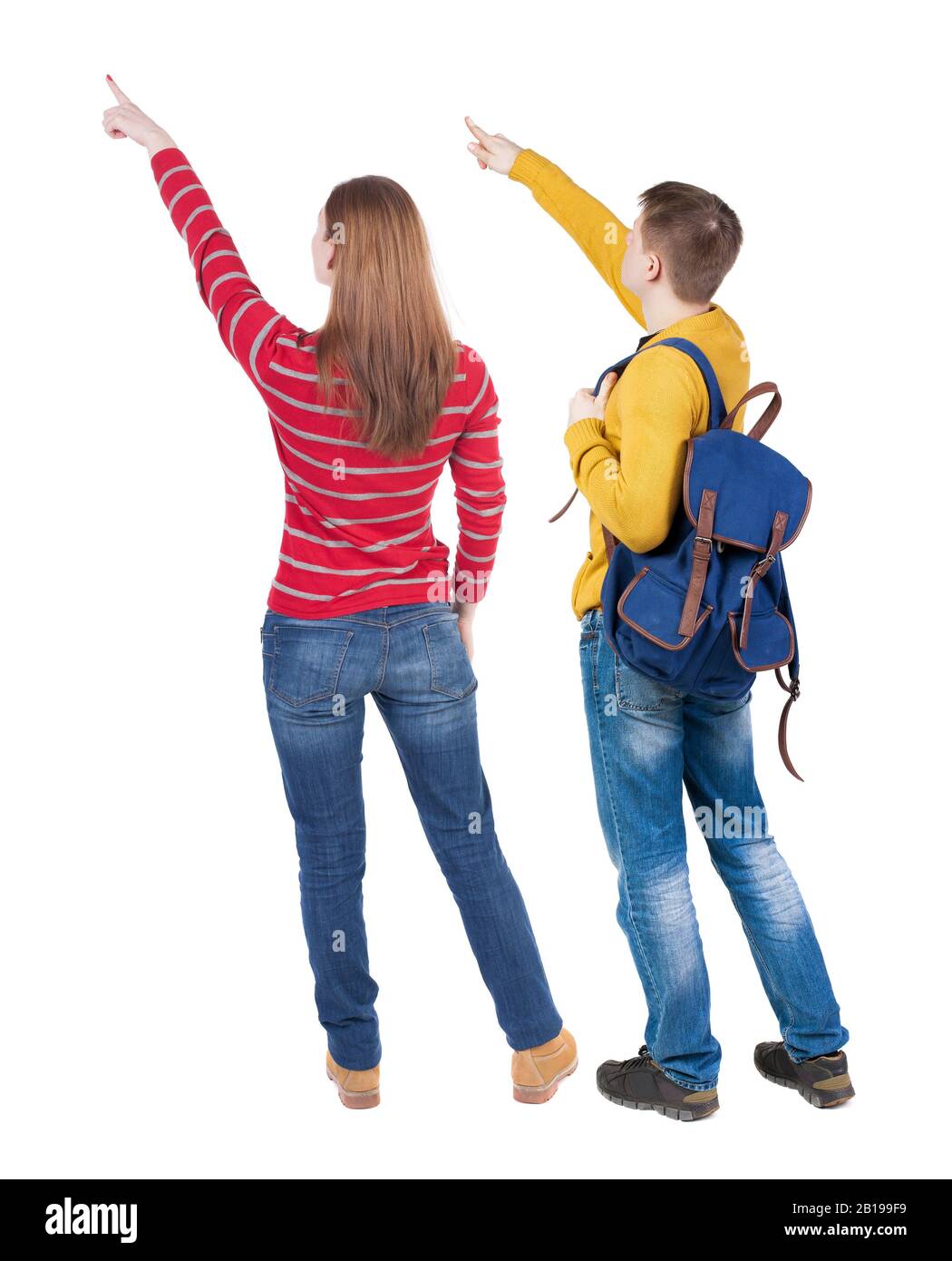 Back view of couple couple in sweater pointing. Rear view people ...