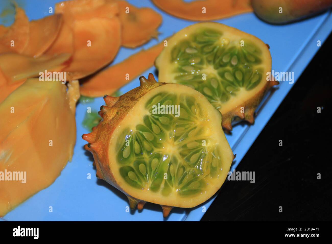 Exotic unusual African fruit kivano melon (Antilles cucumber, horned ...