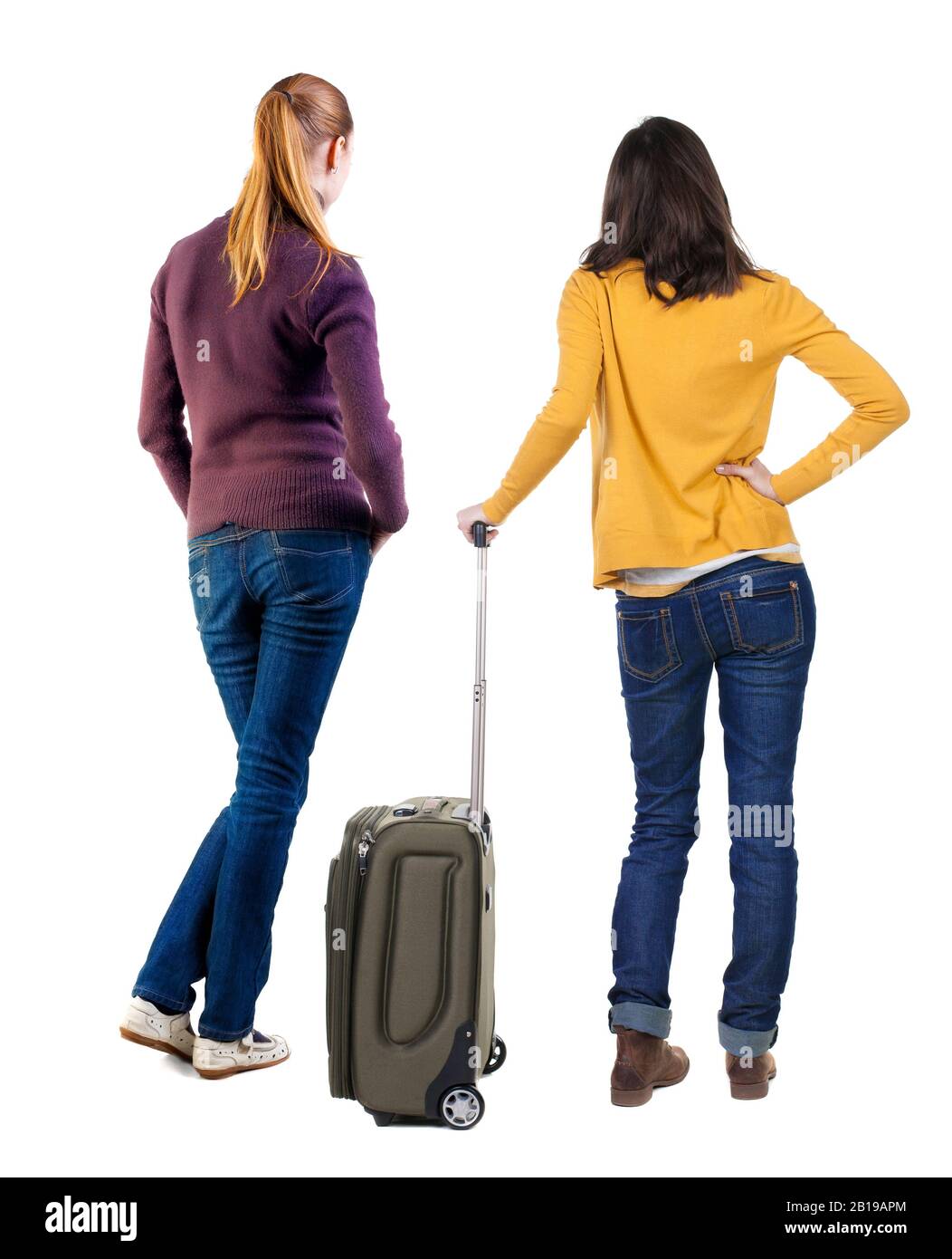 Back view of two woman in sweater with suitcas. Back view. Rear view ...