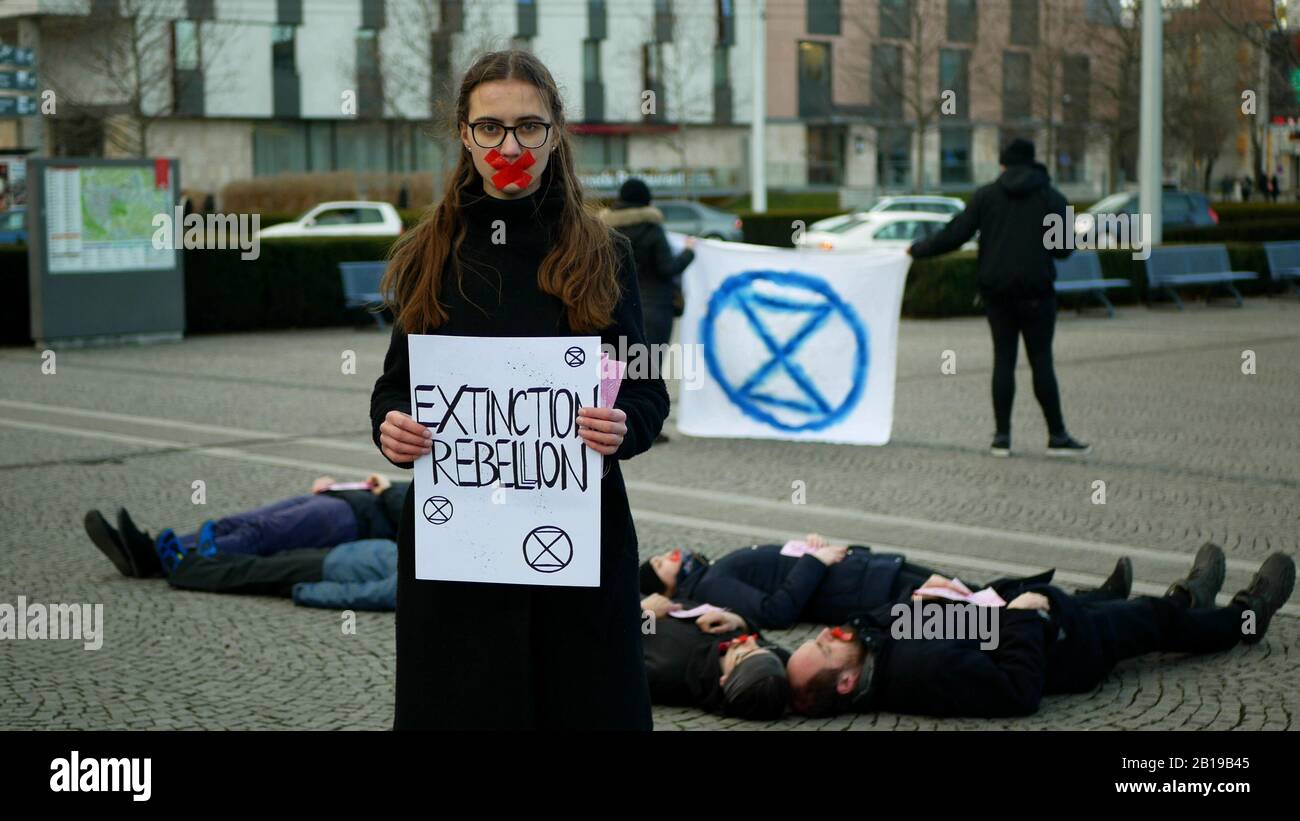 Extinction rebellion girl activist Anna Martinkova banner symbol circle ...
