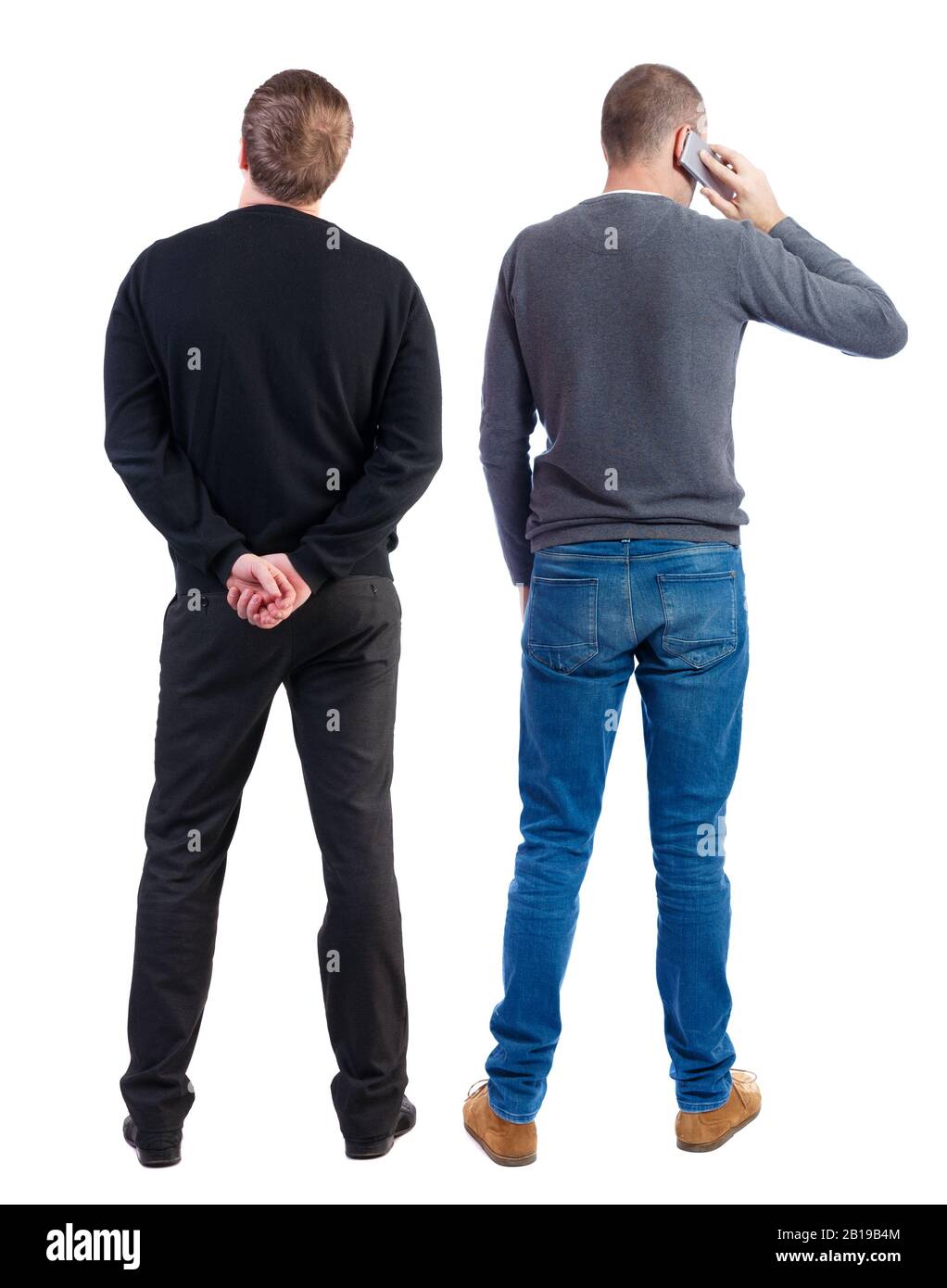 Back view of two man in sweater with mobile phone. Rear view people ...
