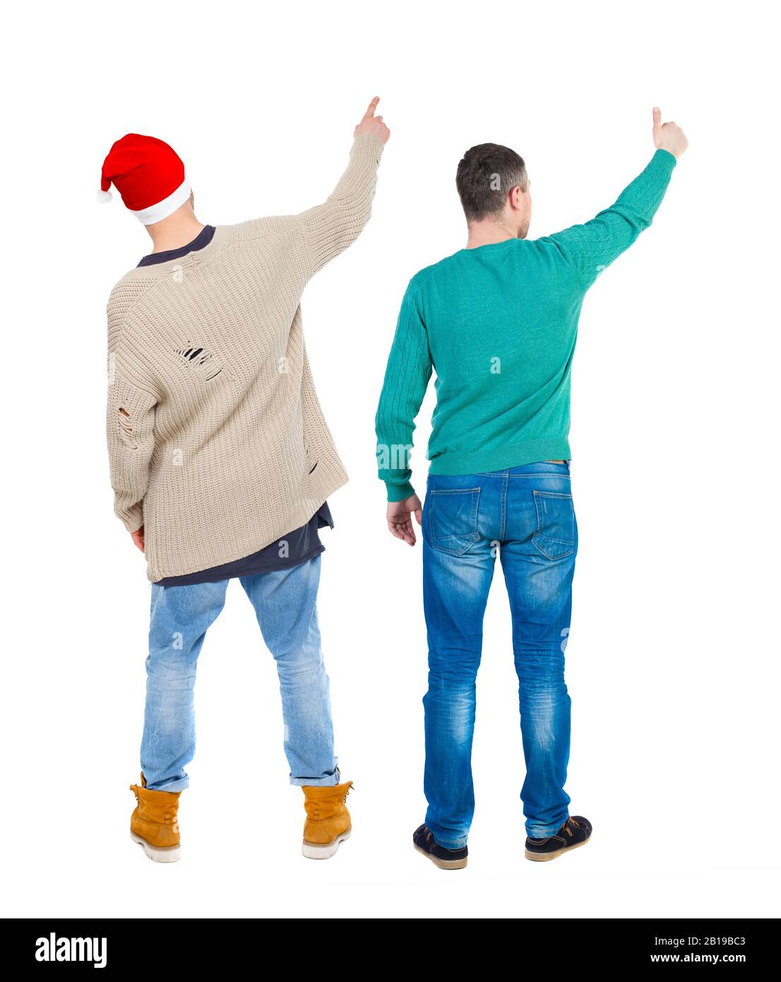 Back view of two man in sweater pointing. Rear view people collection ...