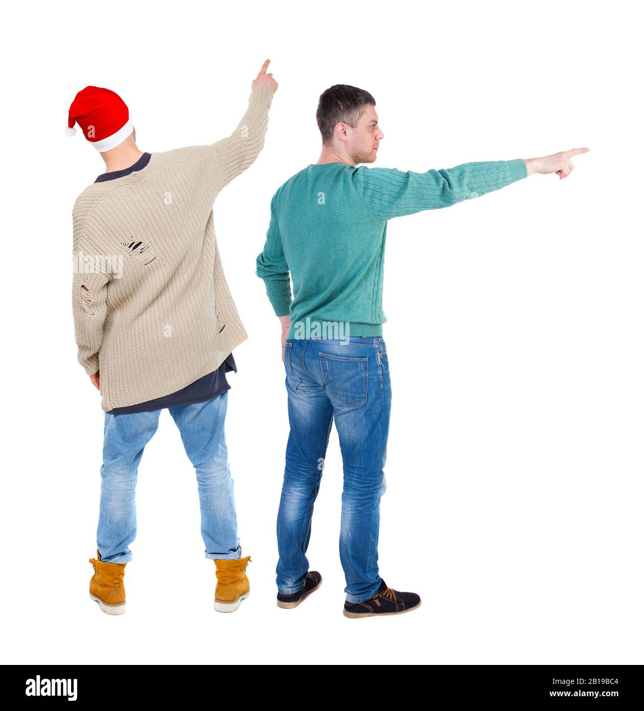 Back view of two man in sweater pointing. Rear view people collection ...
