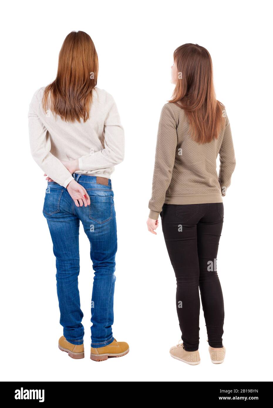 Back view of two woman in sweater. Rear view people collection ...