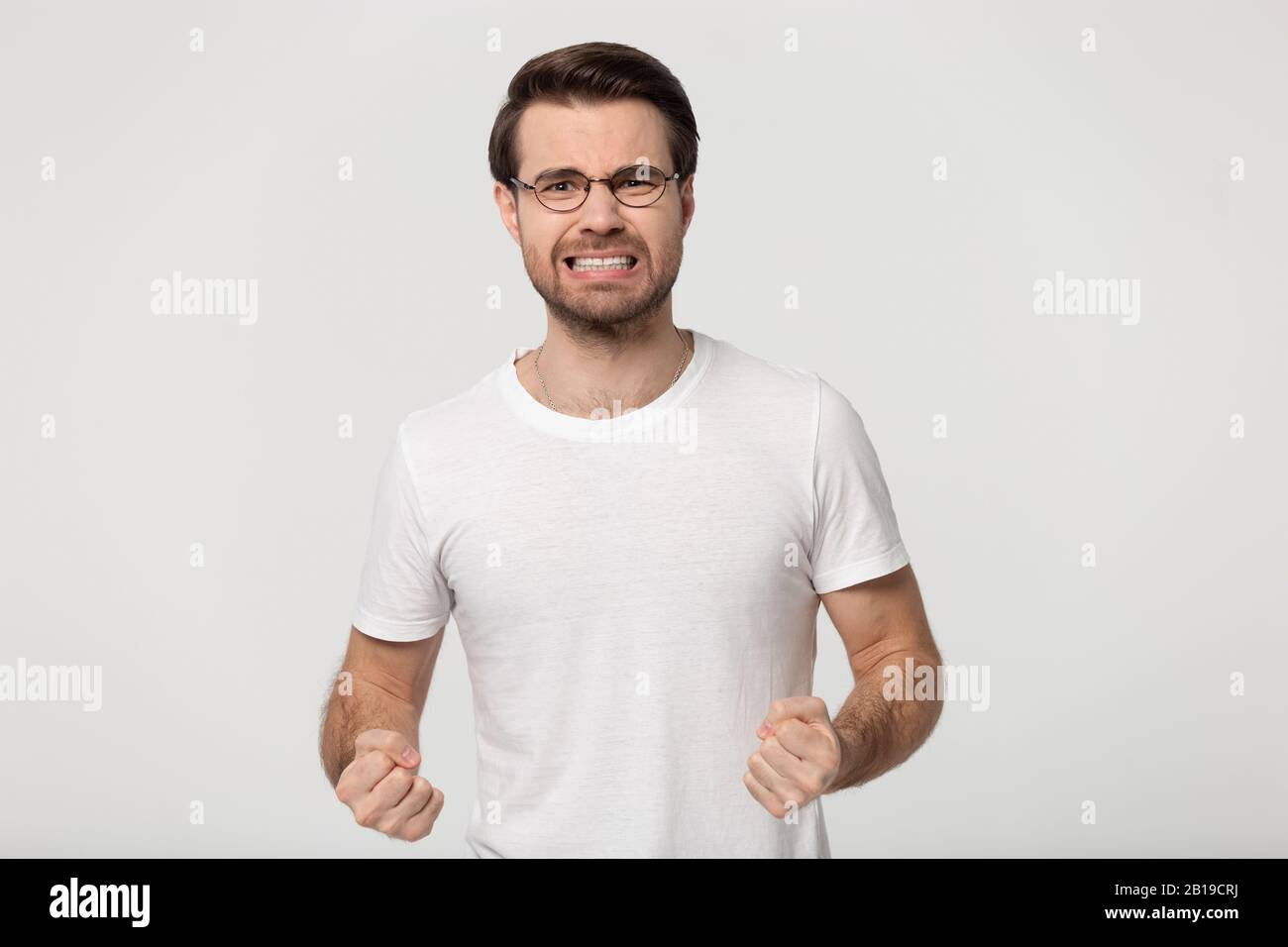 Angry man showing teeth hi-res stock photography and images - Alamy