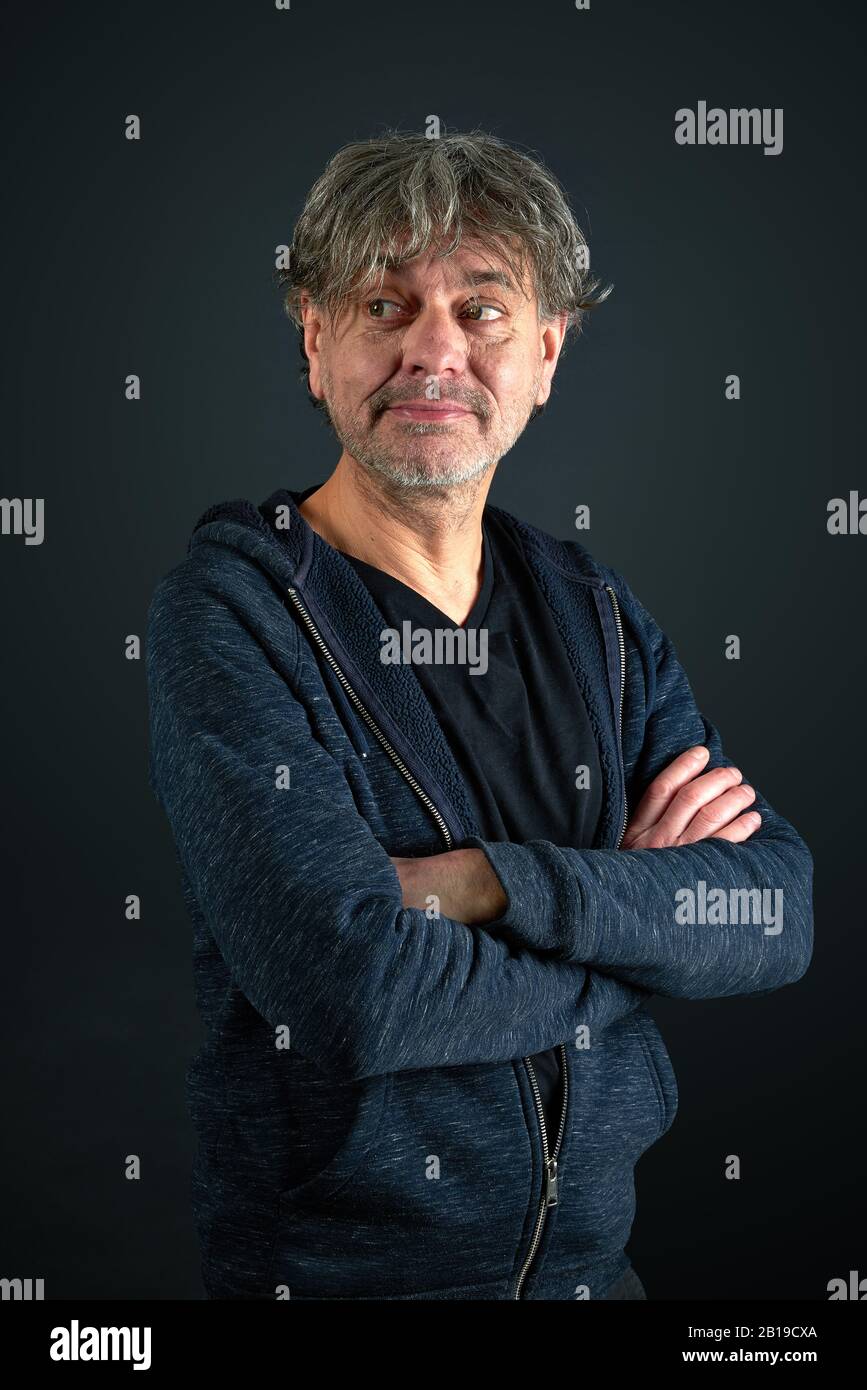 Portrait of a man with blue shirt on gradient background Stock Photo ...