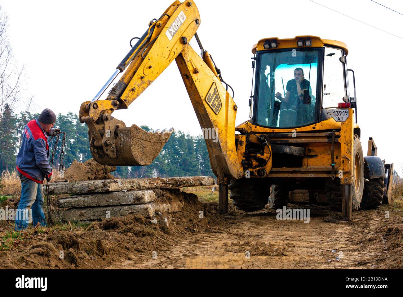 Trostyanets, Ukraine December 20, 2019: an excavator in the village ...