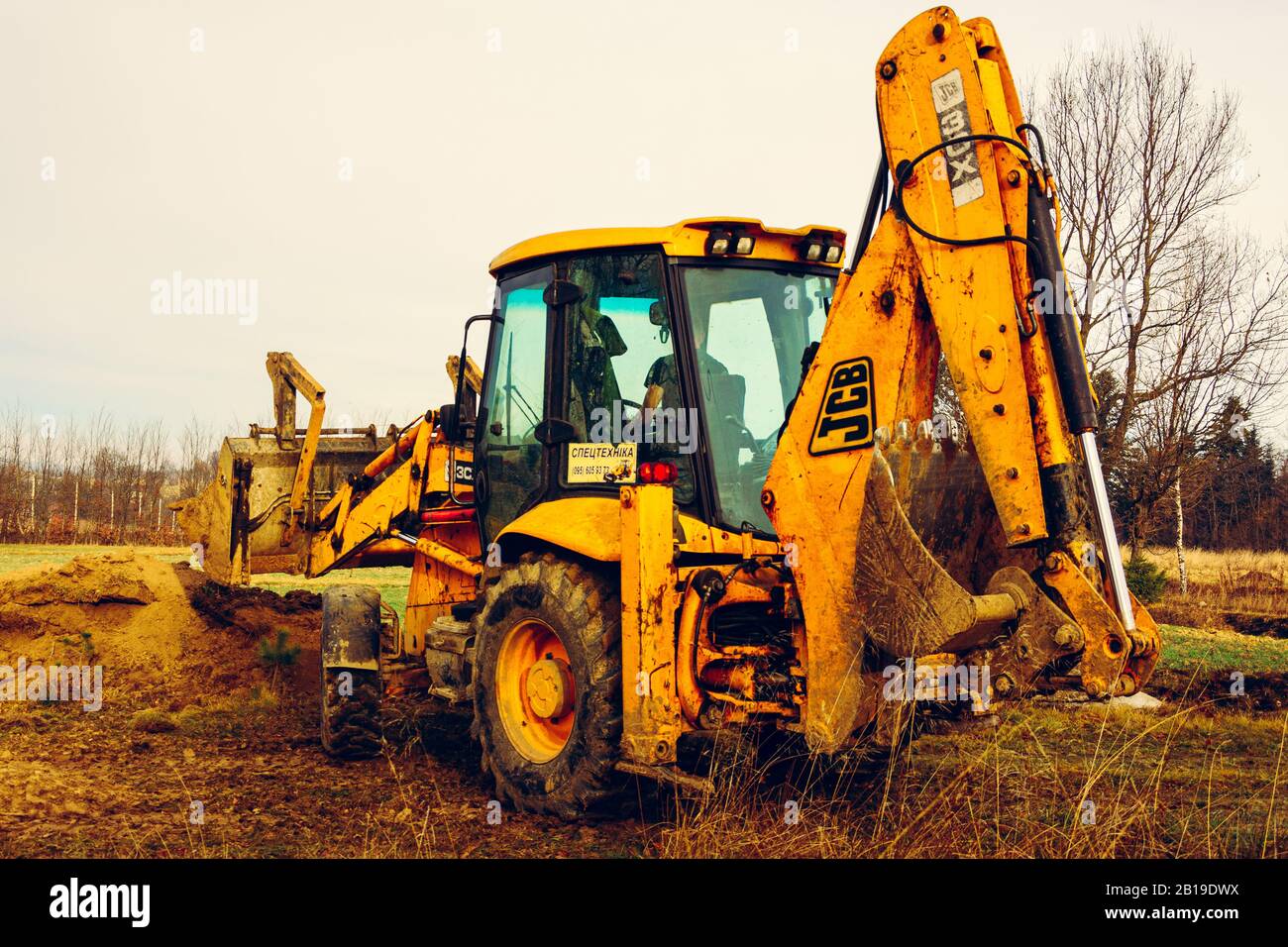 Trostyanets, Ukraine December 20: excavator transports concrete slabs ...