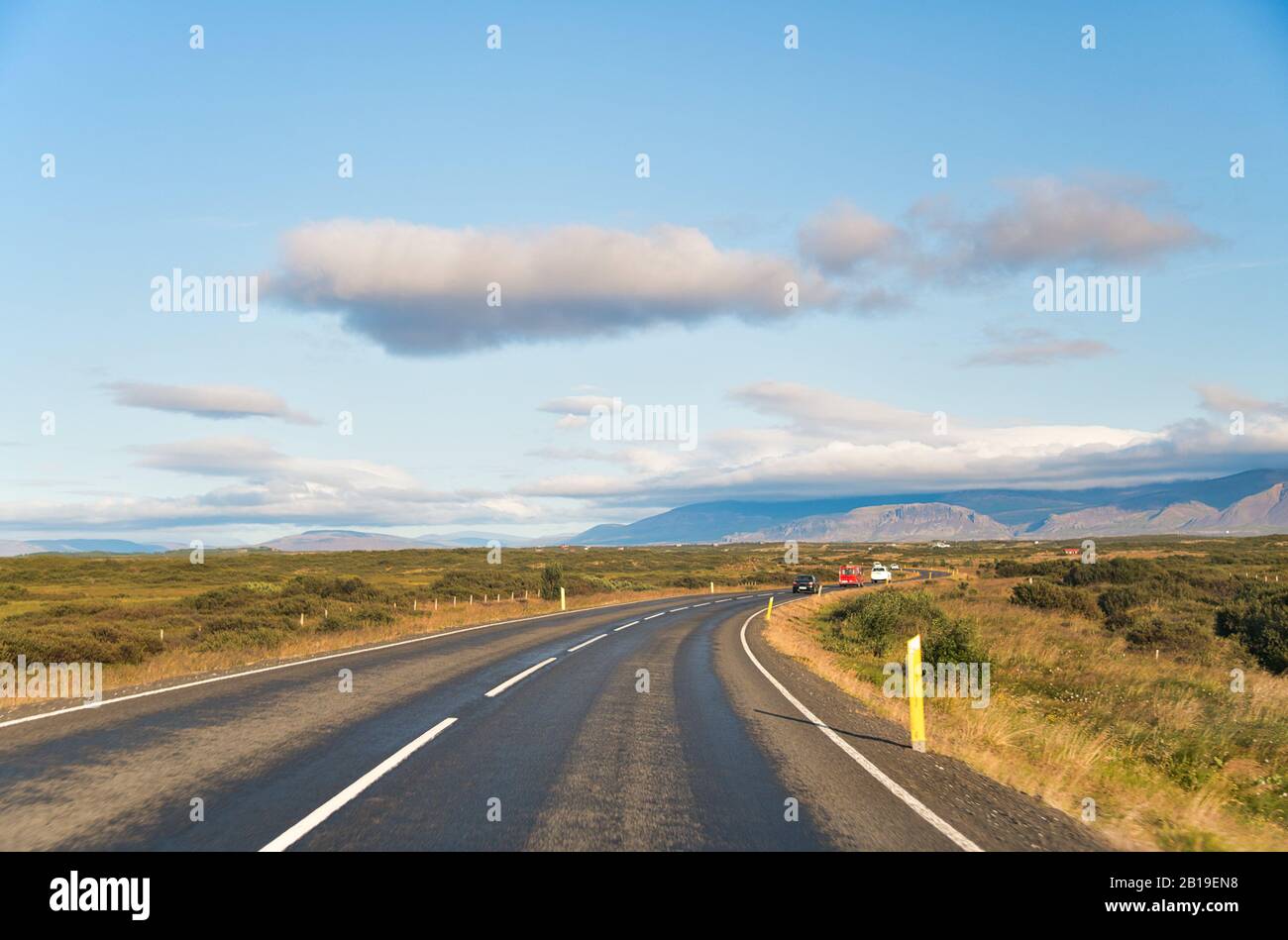 Beautiful landscape scenario with dramatic sky along the ring road ...