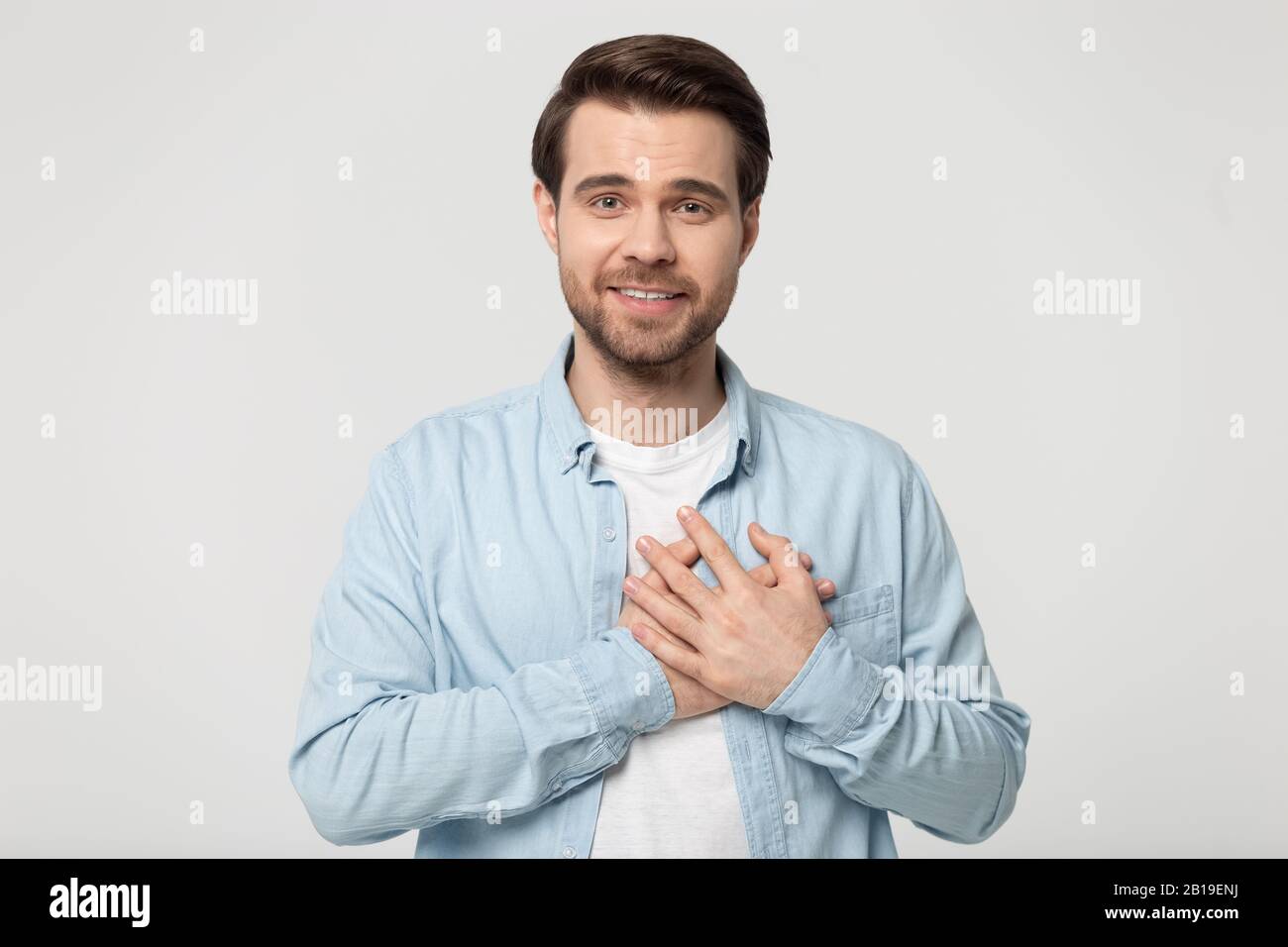 Hands folded to chest hi-res stock photography and images - Alamy