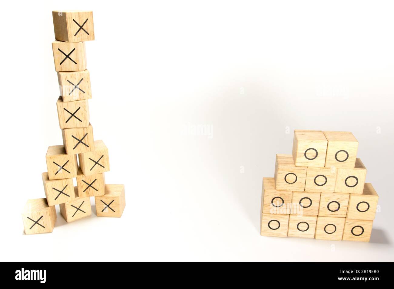 The stacks of different high rectangular wooden cubes to be two stacks ...