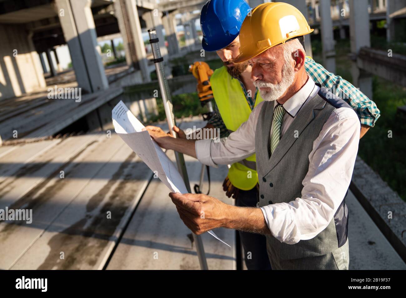 Engineer, contractor, architect teamwork. Construction people talking ...