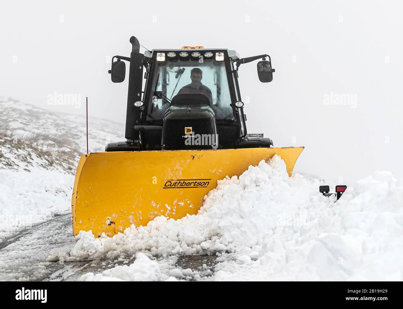 A jcb clears snow hi-res stock photography and images - Alamy