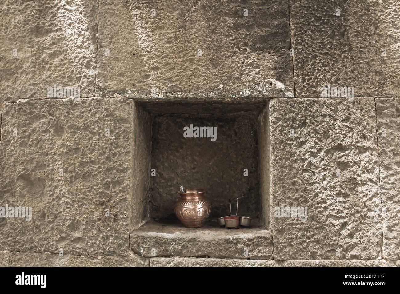 religious vessels kept in a niche on a tempe wall Stock Photo - Alamy