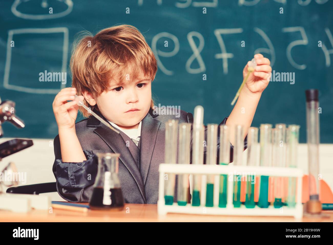 Chemical analysis. Talented scientist. Kid study chemistry ...