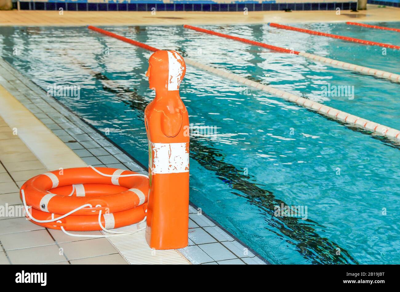 Rescue equipment, dummy and floats in a pool Stock Photo - Alamy