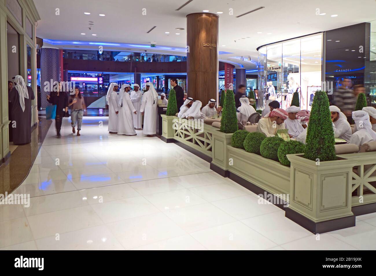 Customers inside the Dubai Mall, Dubai, United Arab Emirates, Middle ...