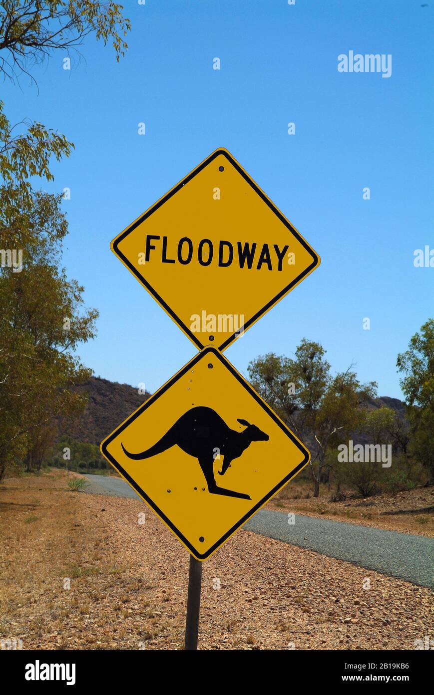 Australia, warning sign for floodway and kangaroo crossing on Ross ...
