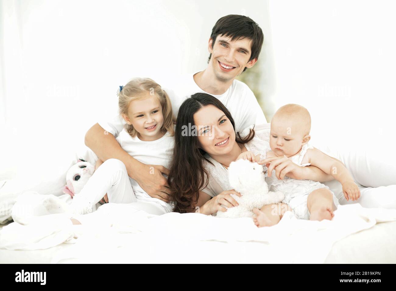 background image of a happy young family Stock Photo - Alamy