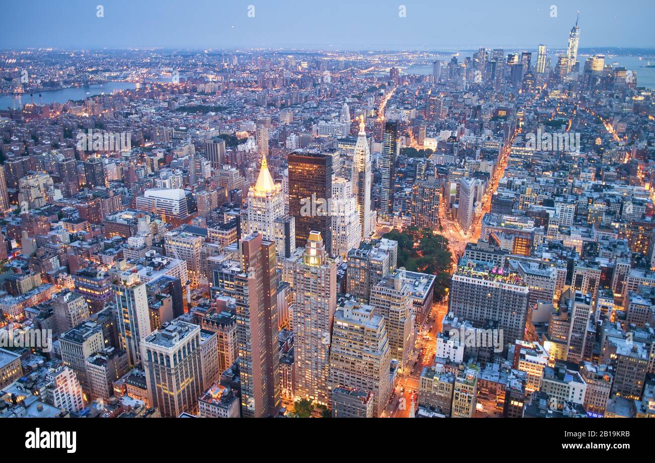New York City, USA. Night aerial view of Midtown Manhattan skyscrapers ...