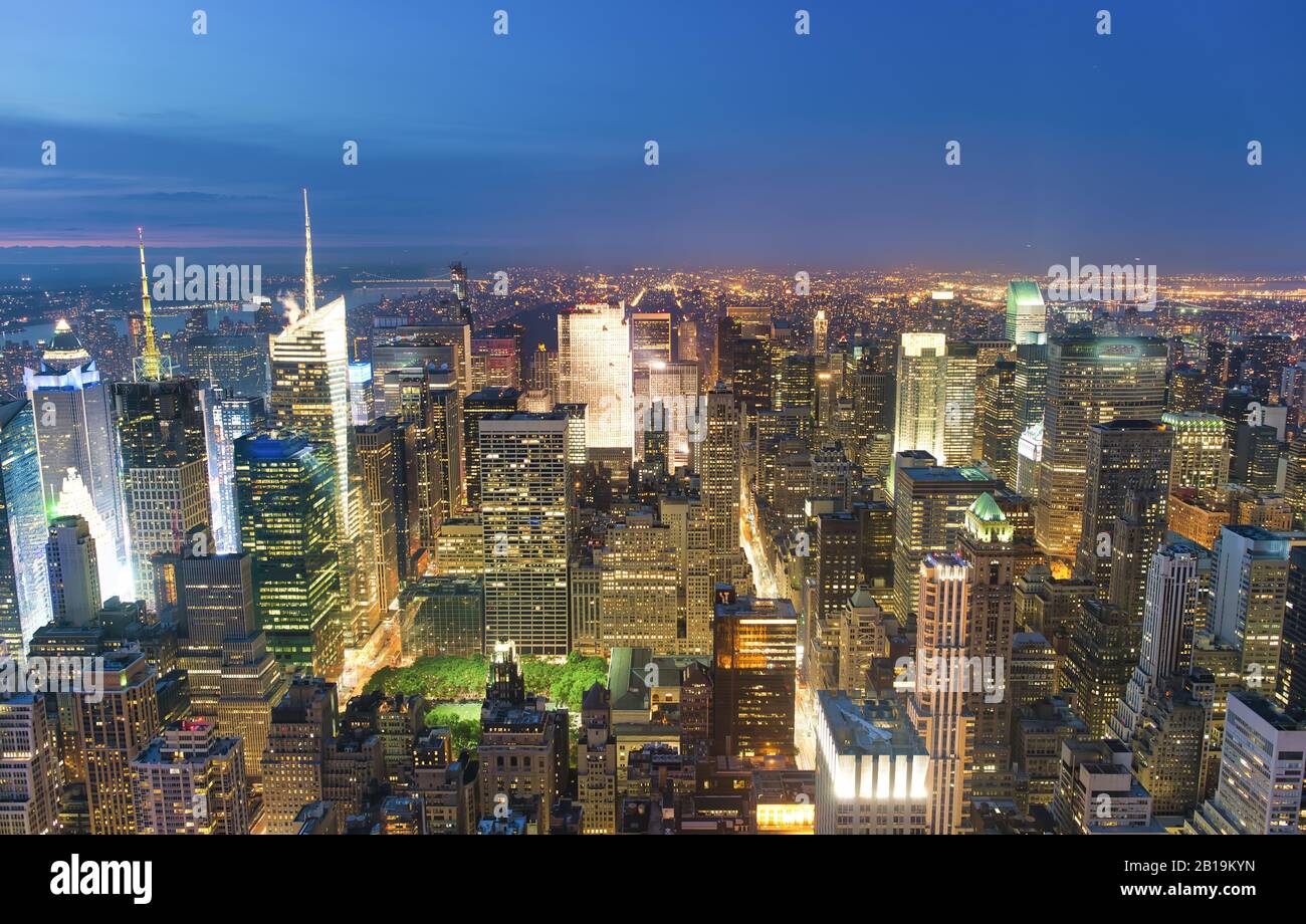 Night aerial view of Midtown Manhattan skyscrapers from a high ...
