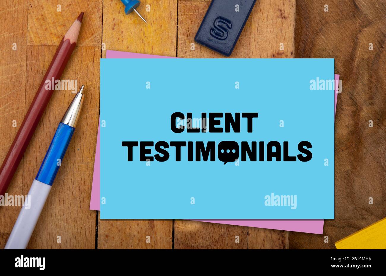 Text of client testimonials on chart paper on wooden background Stock ...