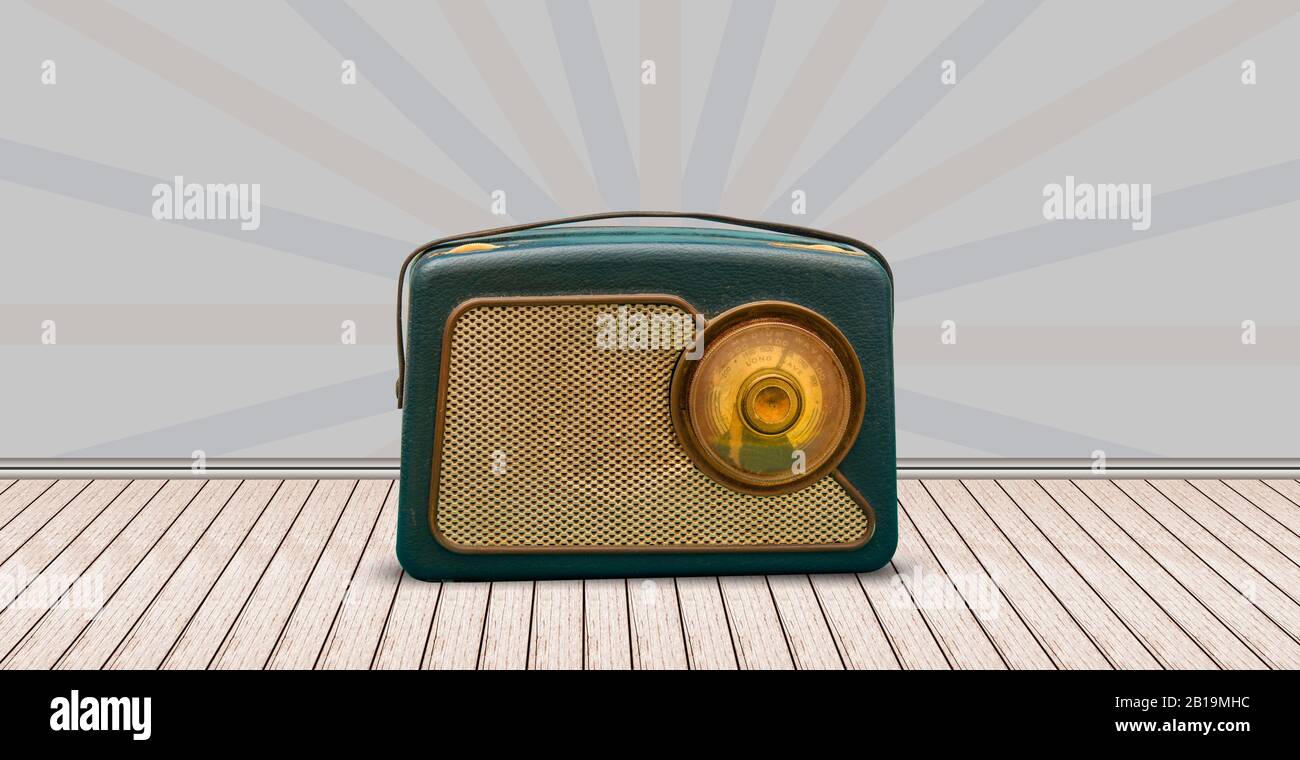 Vintage antique retro old radio on wooden background with copy space ...
