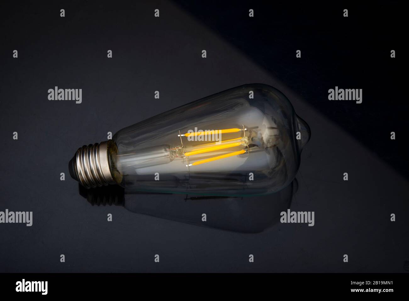 Light bulb on black background, idea concept with copy space Stock ...
