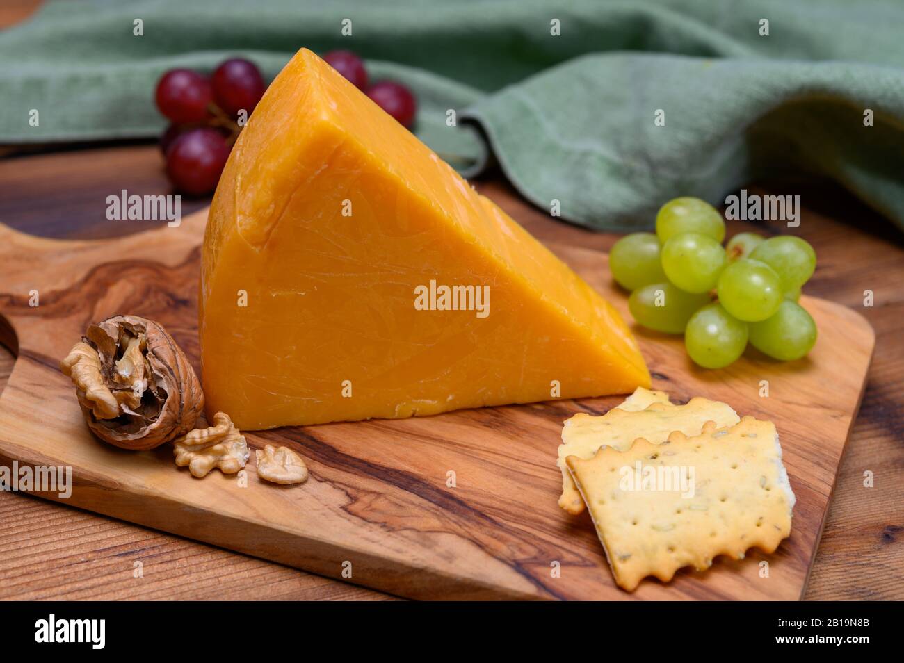 Cheese collection, yellow matured cheddar cheese triangle piece from ...