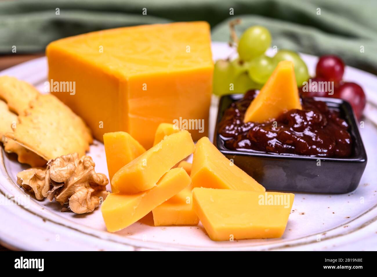 Cheese collection, yellow matured cheddar cheese triangle piece from ...