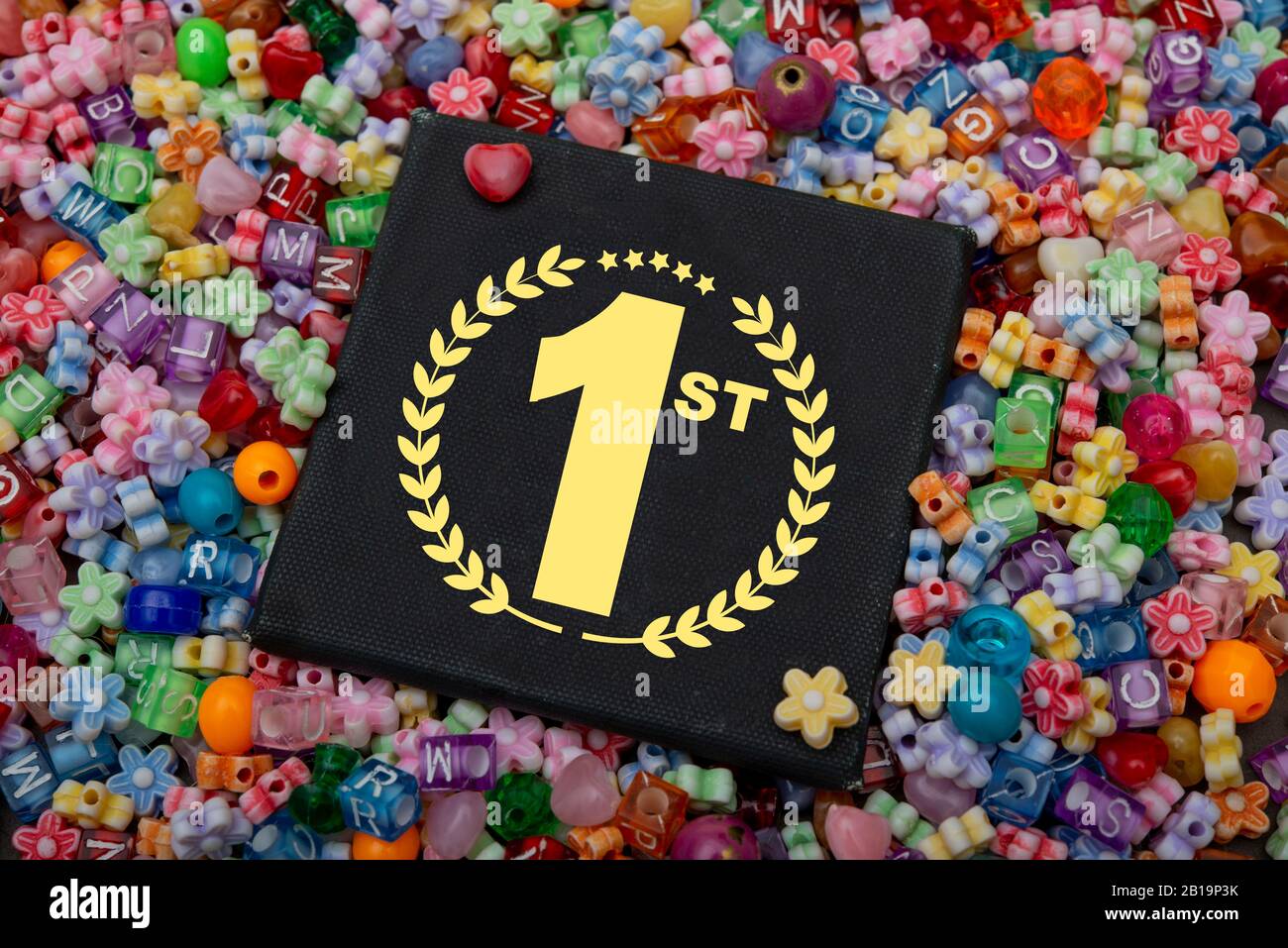 Text of 1st prize winner on gift box with multi-color of kids breads ...