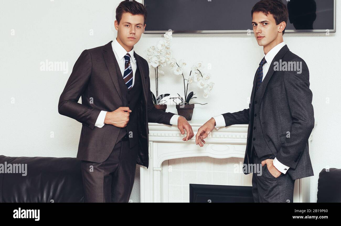 two serious businessmen standing in the meeting room Stock Photo - Alamy