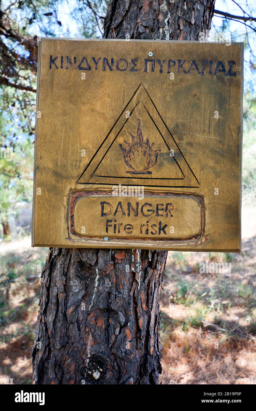 Greece, Thassos Island, warning sign for fire risk Stock Photo - Alamy