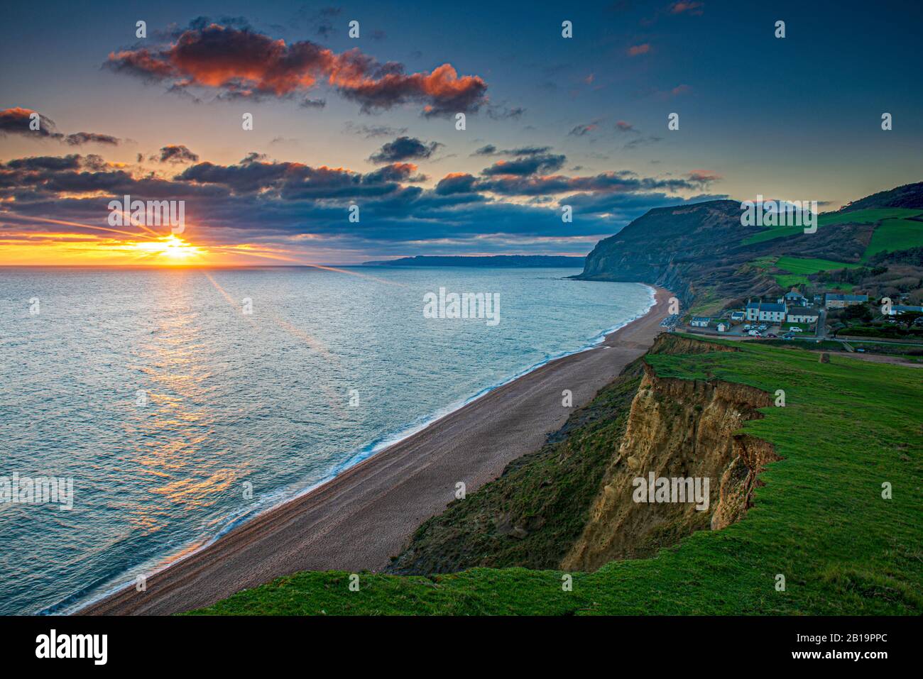 Sunset at Seatown with views of Golden Cap and Lyme Regis, Dorset ...