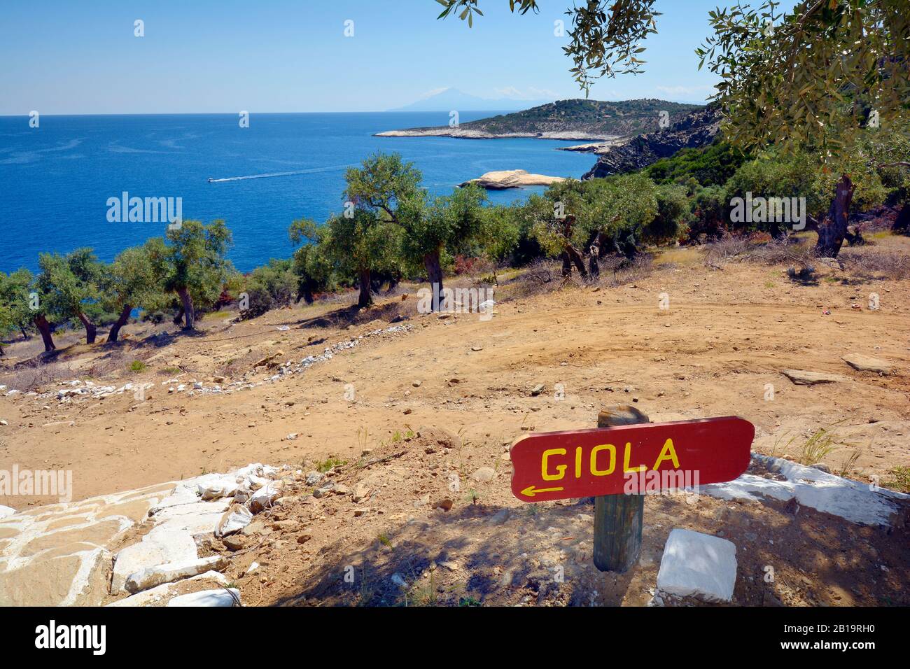 Greece, Thassos Island, signpost to Giola rock pool and view to holy ...