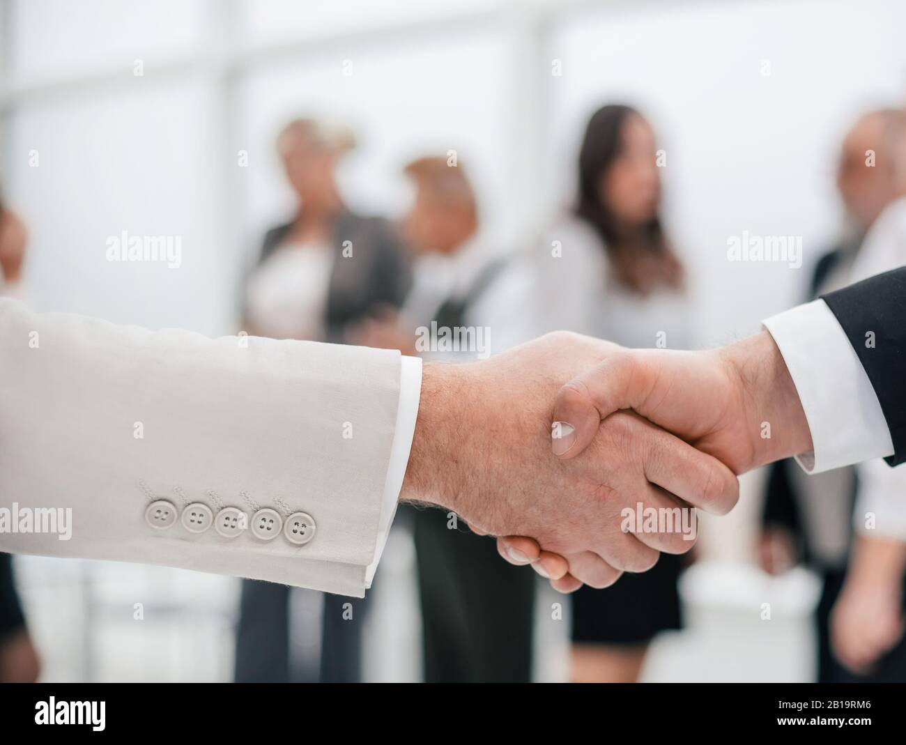 close up. business handshake on office background Stock Photo - Alamy