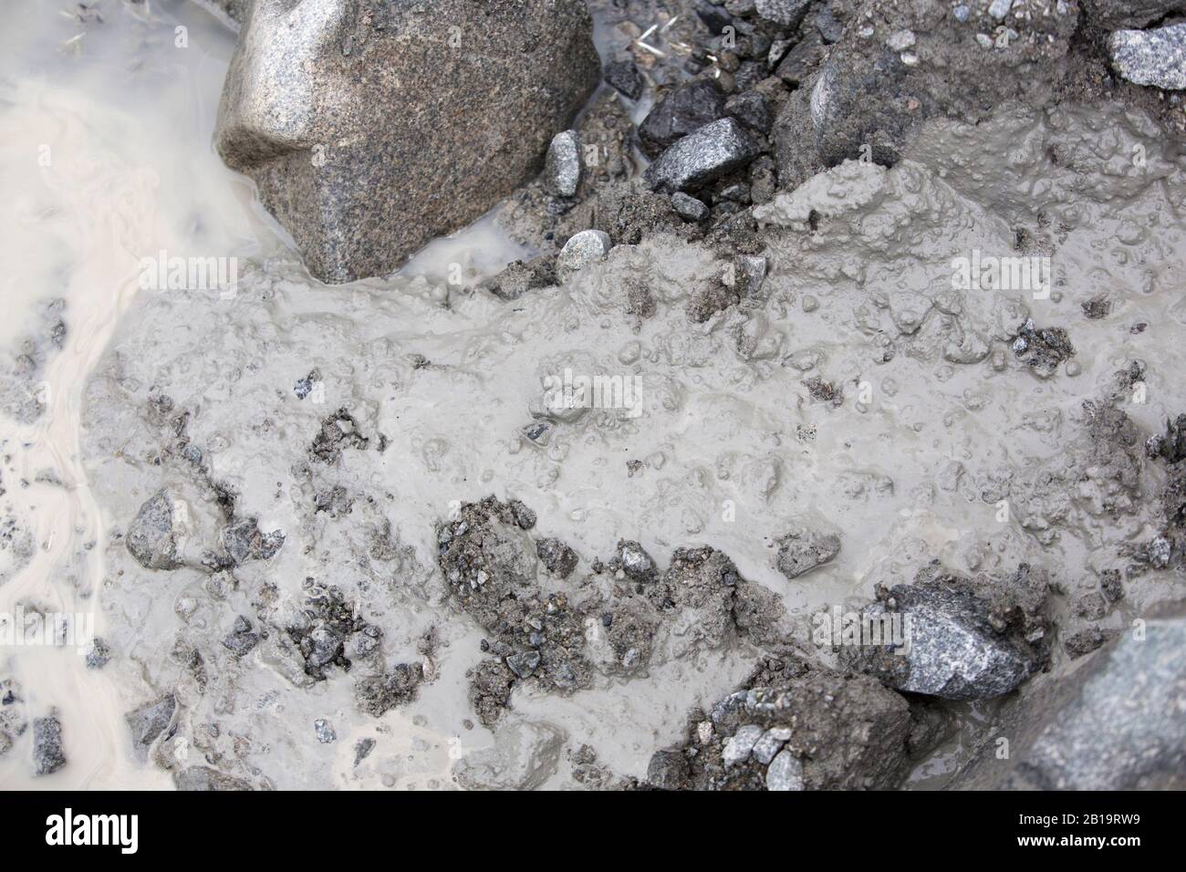 Rock flour mud at the snout of a receding glacier at Fort Point, on ...