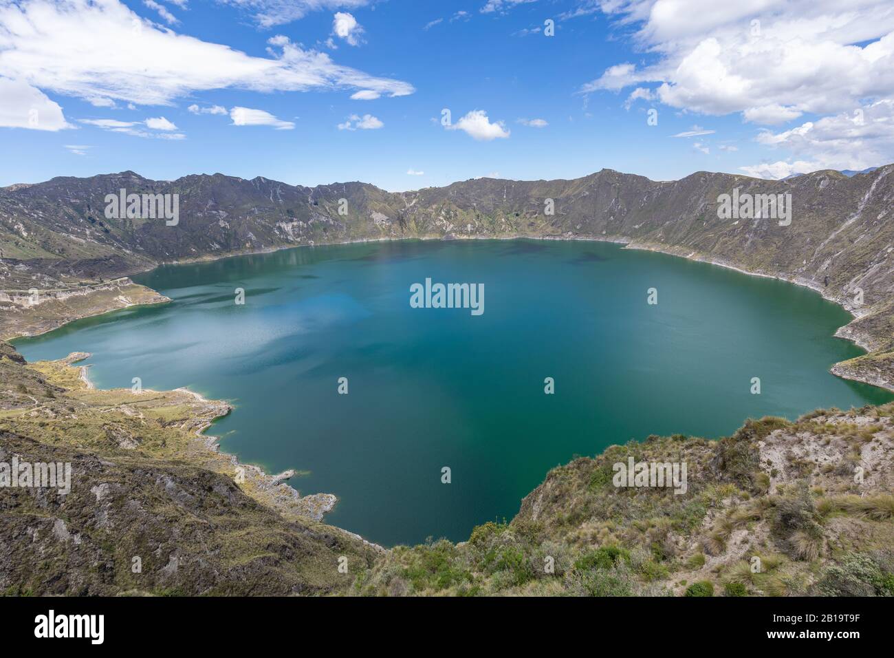 Lake Quilotoa. Panorama of the turquoise volcano crater lagoon of ...
