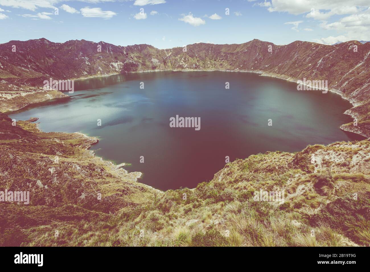 Lake Quilotoa. Panorama of the turquoise volcano crater lagoon of ...