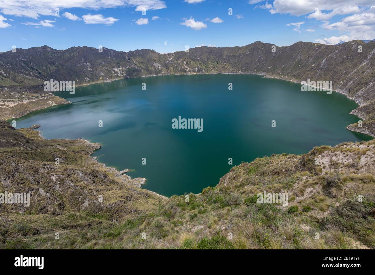 Lake Quilotoa. Panorama of the turquoise volcano crater lagoon of ...
