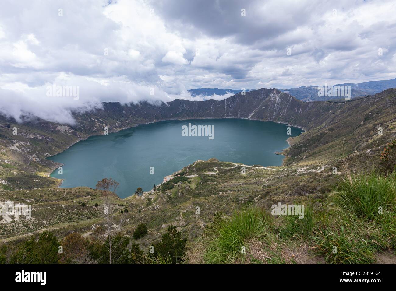 Lake Quilotoa. Panorama of the turquoise volcano crater lagoon of ...