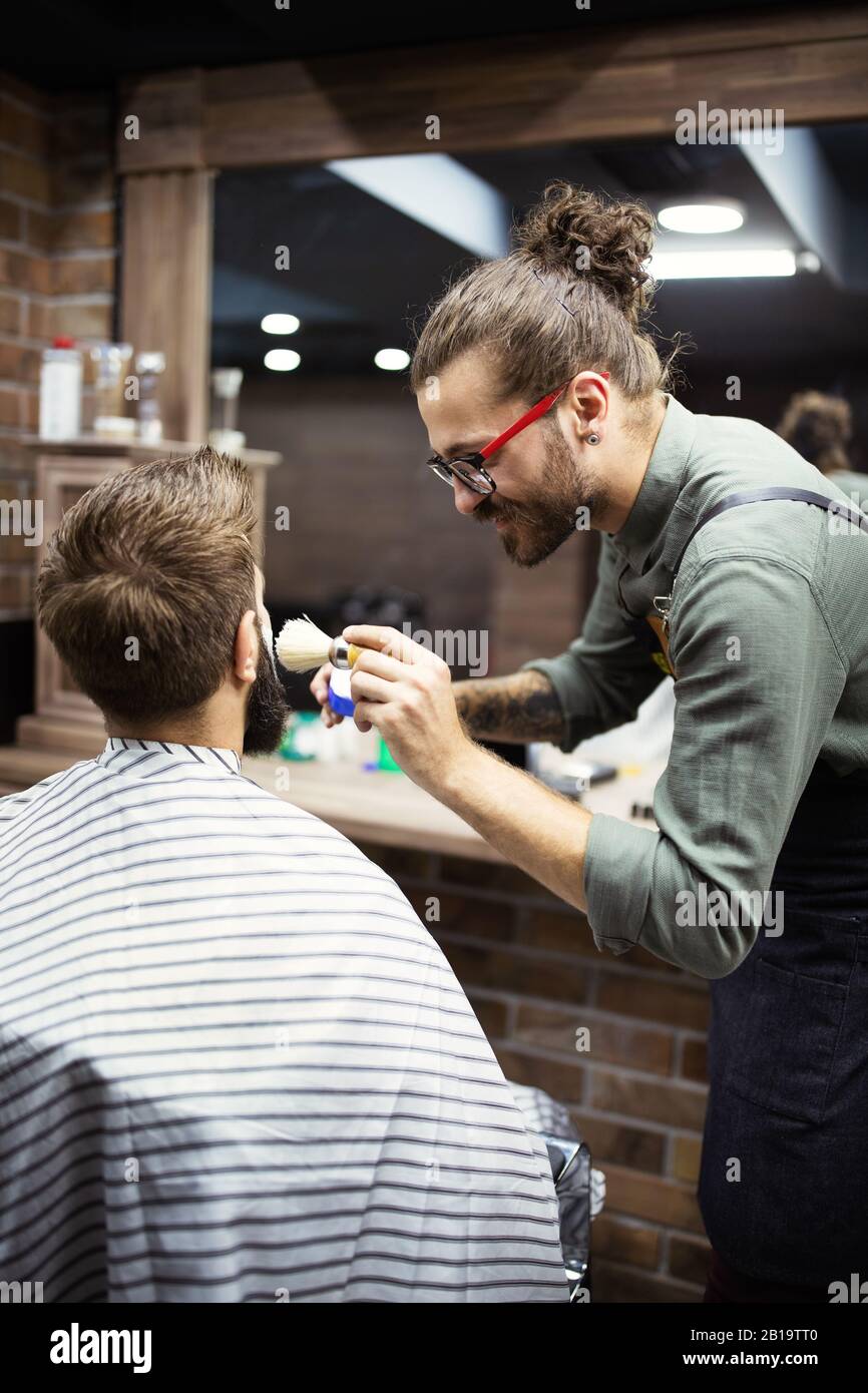 Close up young shaving man hi-res stock photography and images - Alamy
