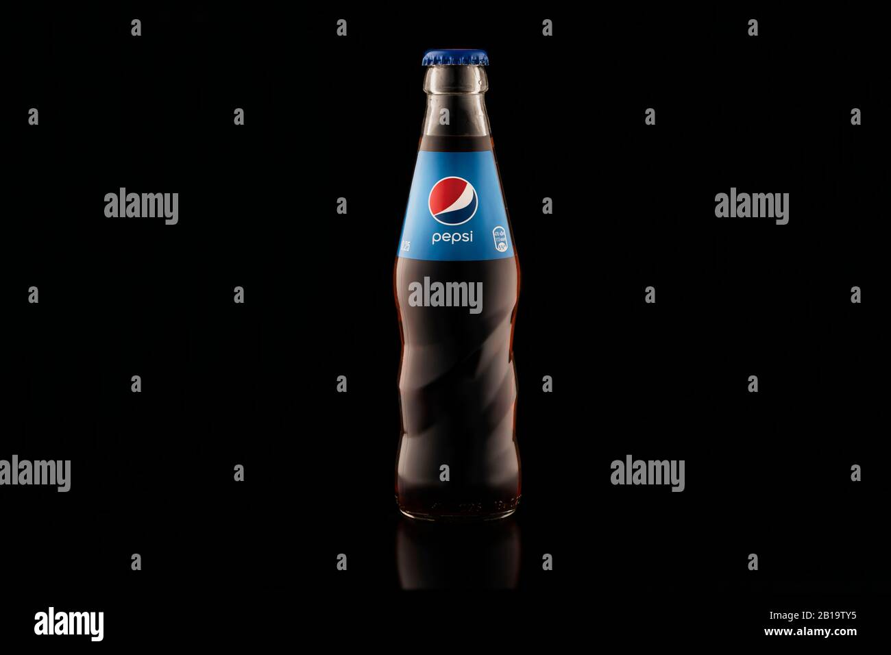Pepsi-soda bottle close-up on a black background Stock Photo - Alamy