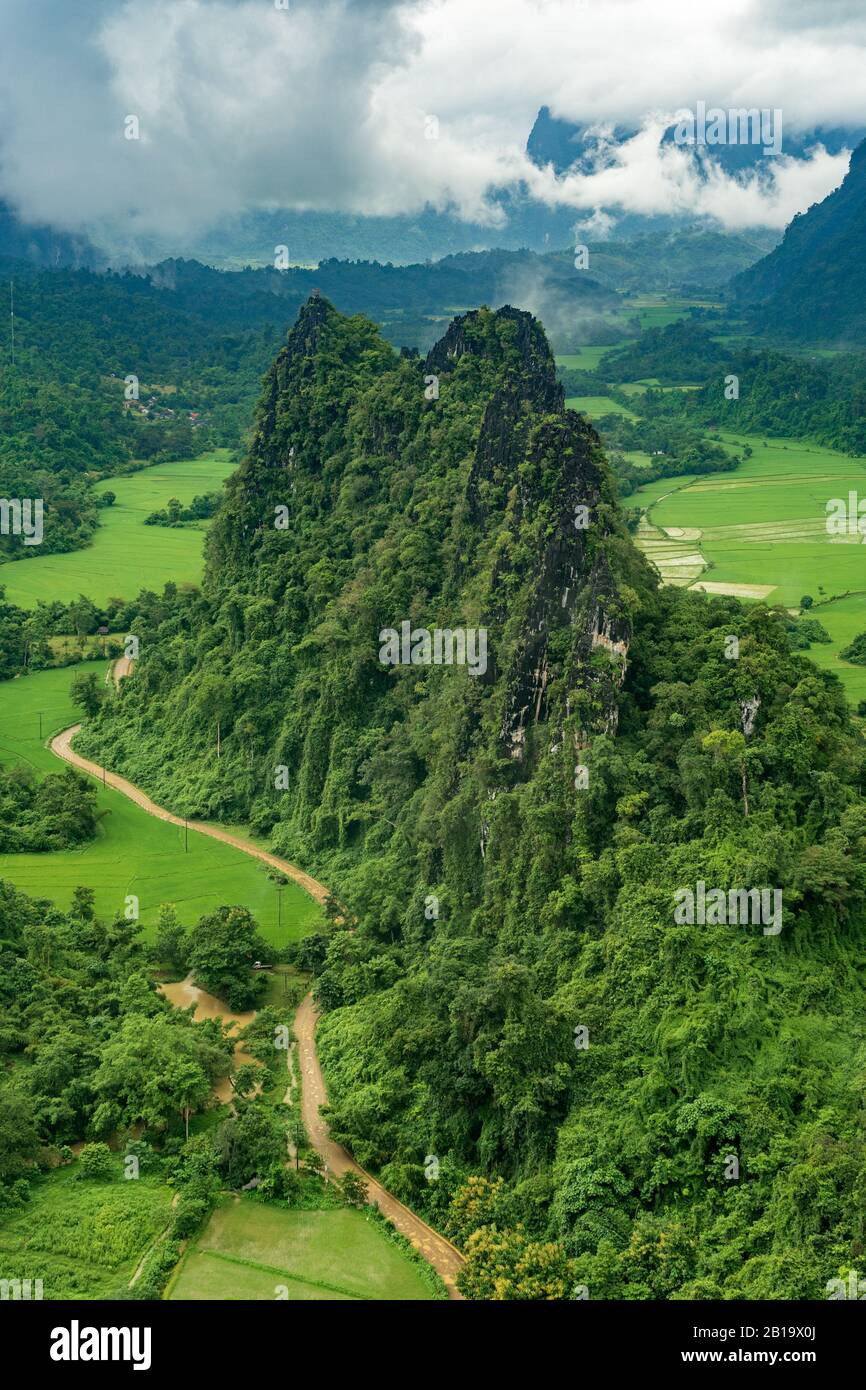 Lush and green mountain view of Vang Vieng, Laos, during the rainy ...