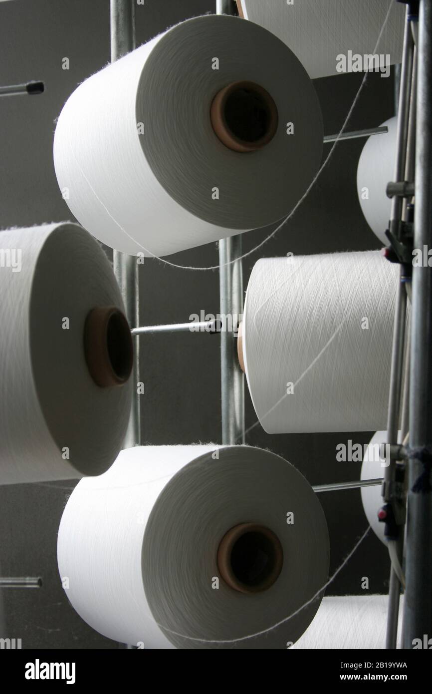 bobbins in textile factory Stock Photo - Alamy