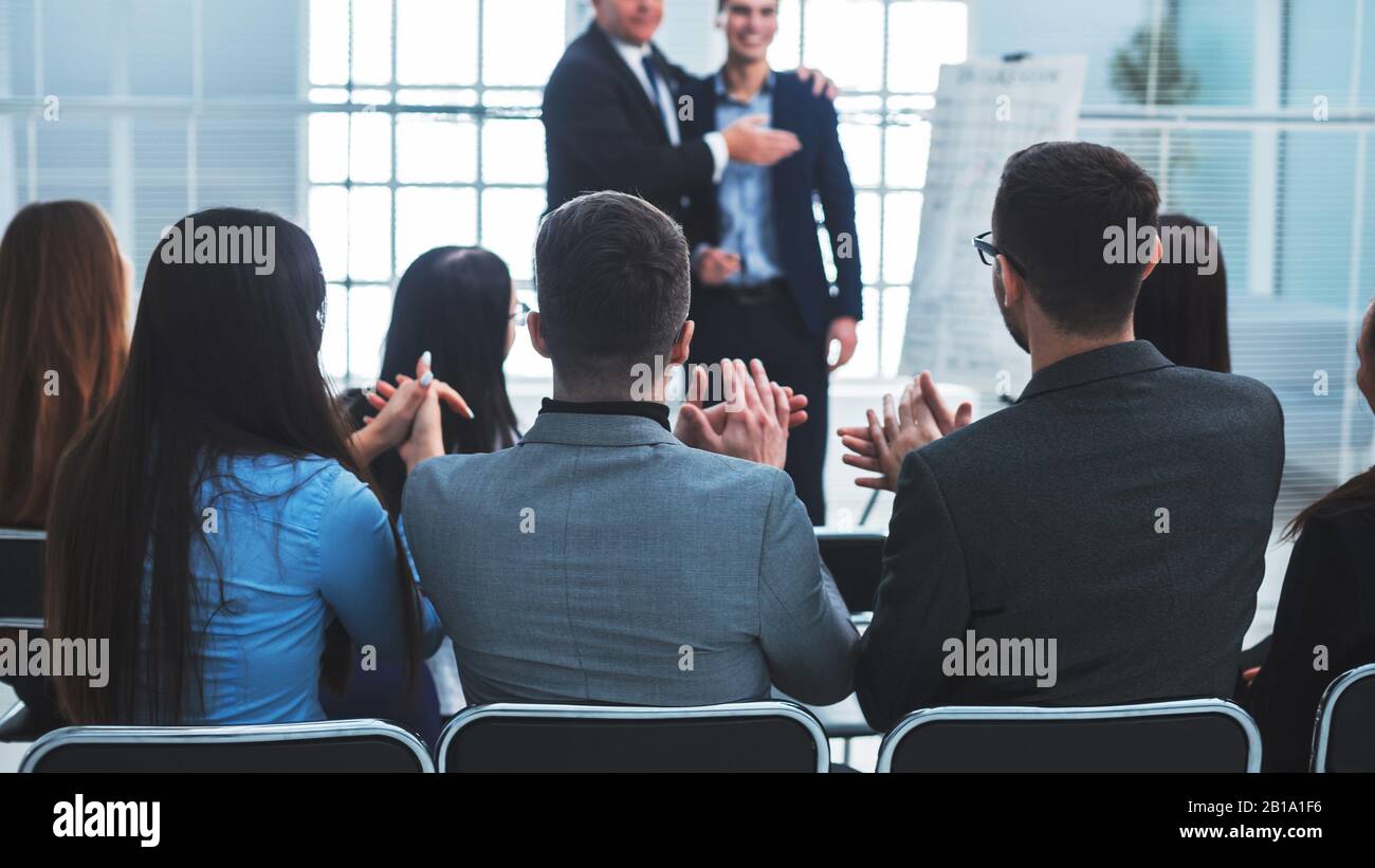 project Manager congratulating the best employee of the company Stock ...