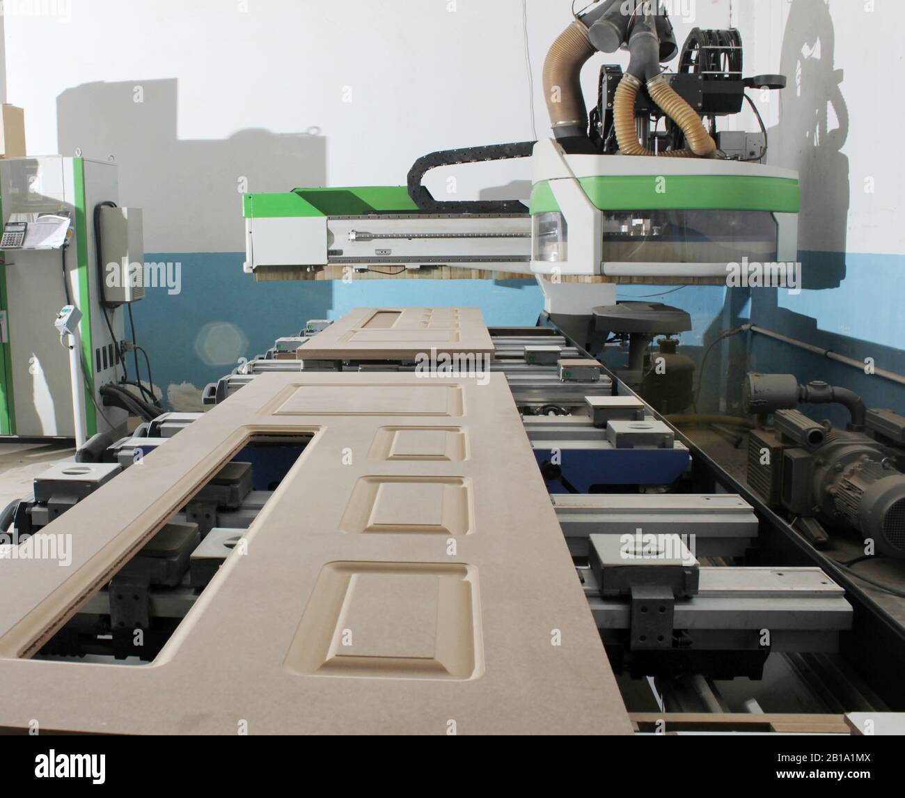 Wooden doors manufacturing hi-res stock photography and images - Alamy