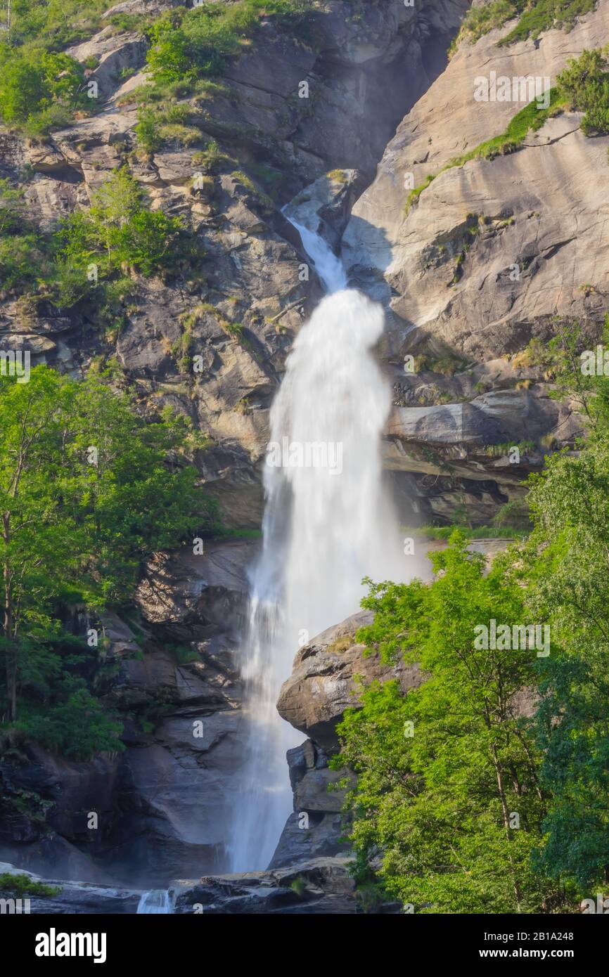 The particular waterfall of Noasca in Piedmont/ Italy is located behind ...