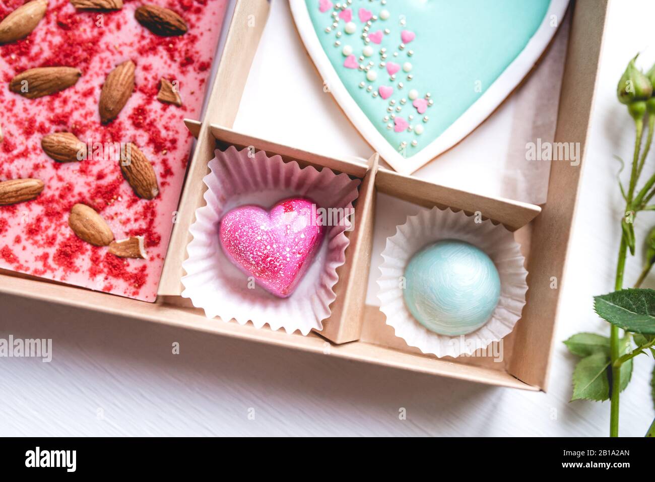 Gift set with hand made sweets in a box on a white table Stock Photo ...