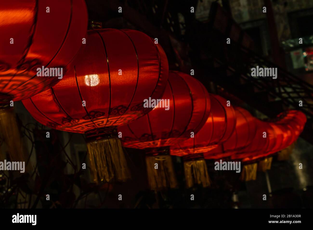 Chinese lantern & light bulb on dark background. The interior asian ...